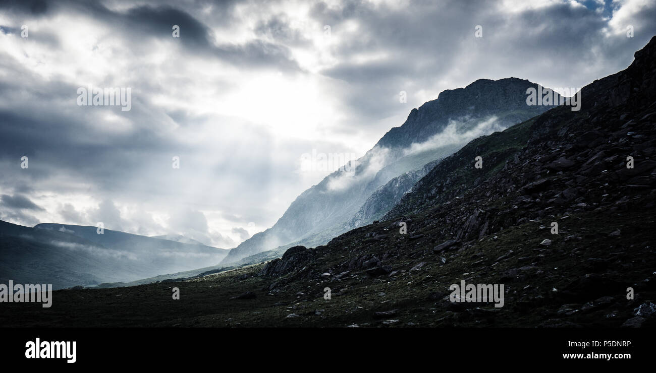 Mountains in Snowdonia during a morning of dramatic weather Stock Photo ...