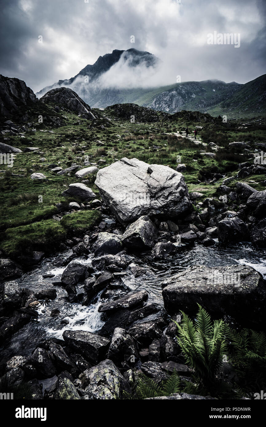 Mountains in Snowdonia during a morning of dramatic weather Stock Photo ...