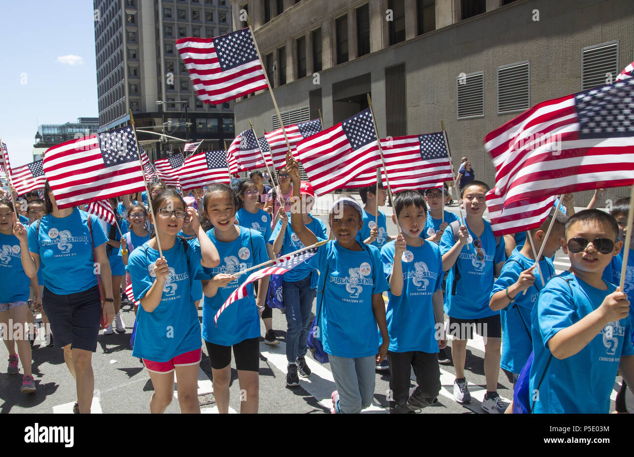 Public school children march in lower Manhattan along Broadway at the ...