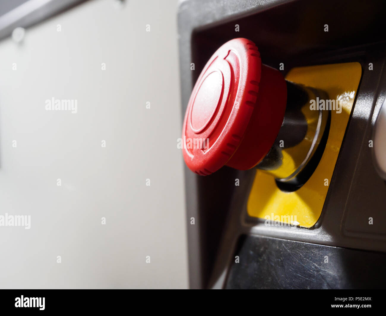 The red emergency button or stop button for Hand press. STOP Button for ...