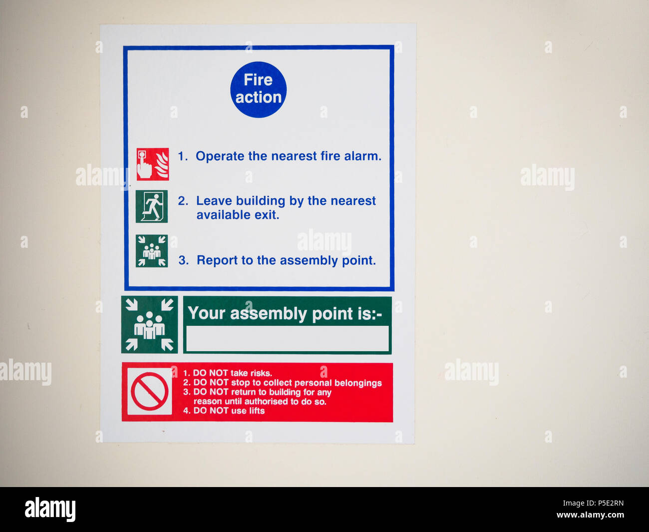 Health and Safety Fire Action Assembly Point UK Sign Stock Photo - Alamy