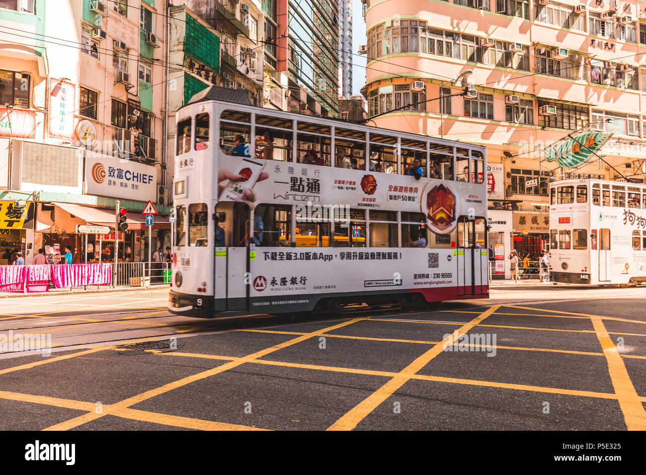 Tram on road hi-res stock photography and images - Alamy