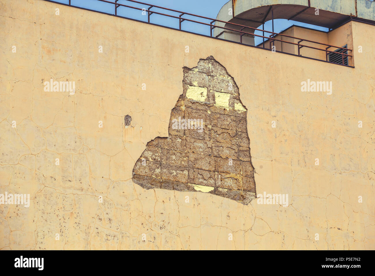 Paint failure on building after heavy rain, collapsed facade. Vintage ...