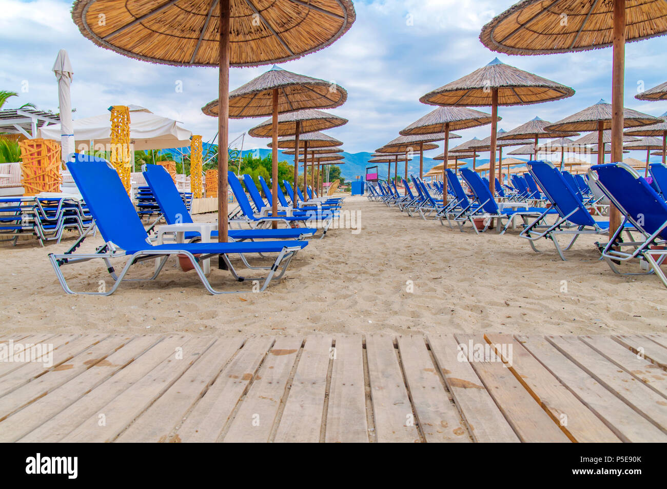 Wooden pier sunbeds in sea hi-res stock photography and images - Alamy
