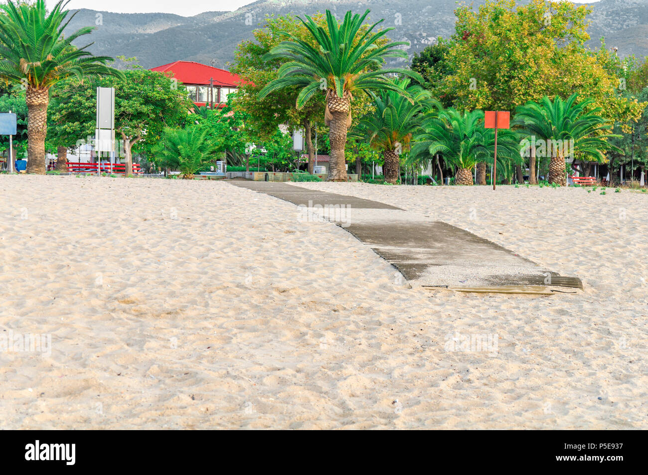 Beach path to the sea with promenada background Stock Photo - Alamy