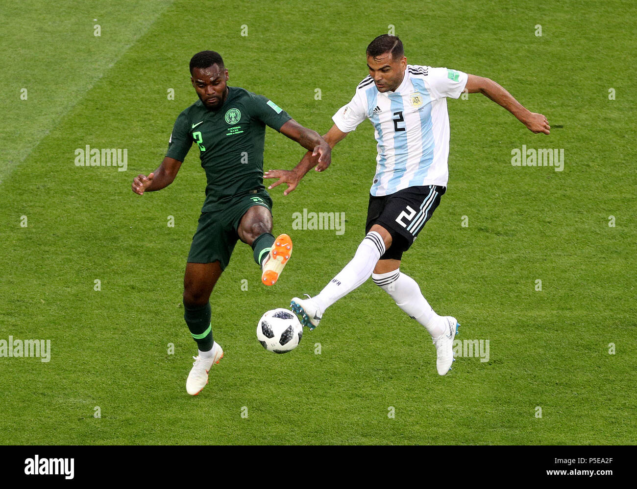 Nigeria's Brian Idowu (left) and Argentina's Gabriel Mercado (right ...