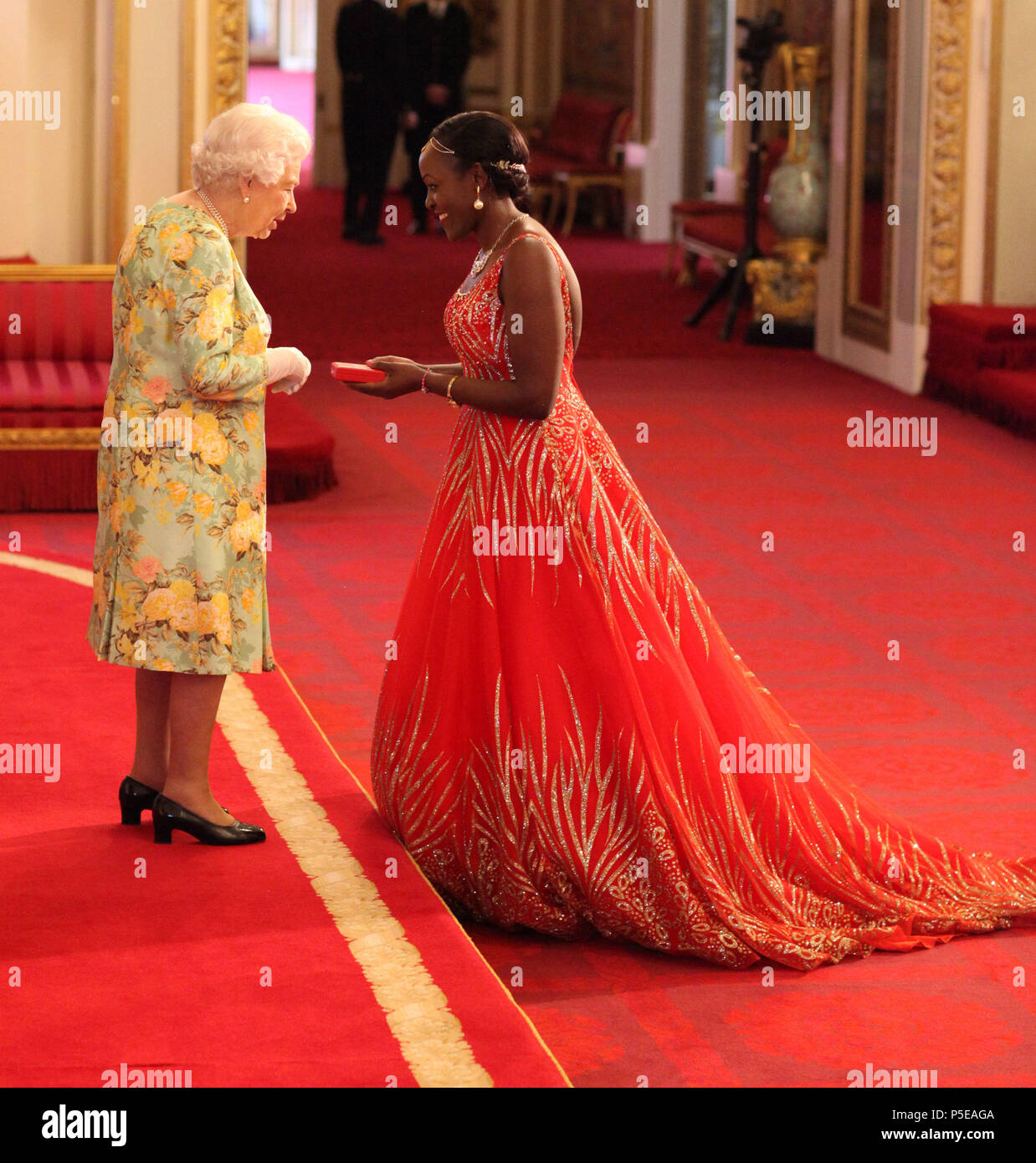 Ms Elizabeth Kasujja from Uganda receives her Young Leaders Award from ...