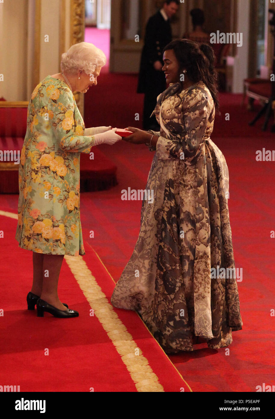 Ms Mavis Elias from Namibia receives her Young Leaders Award from Queen ...