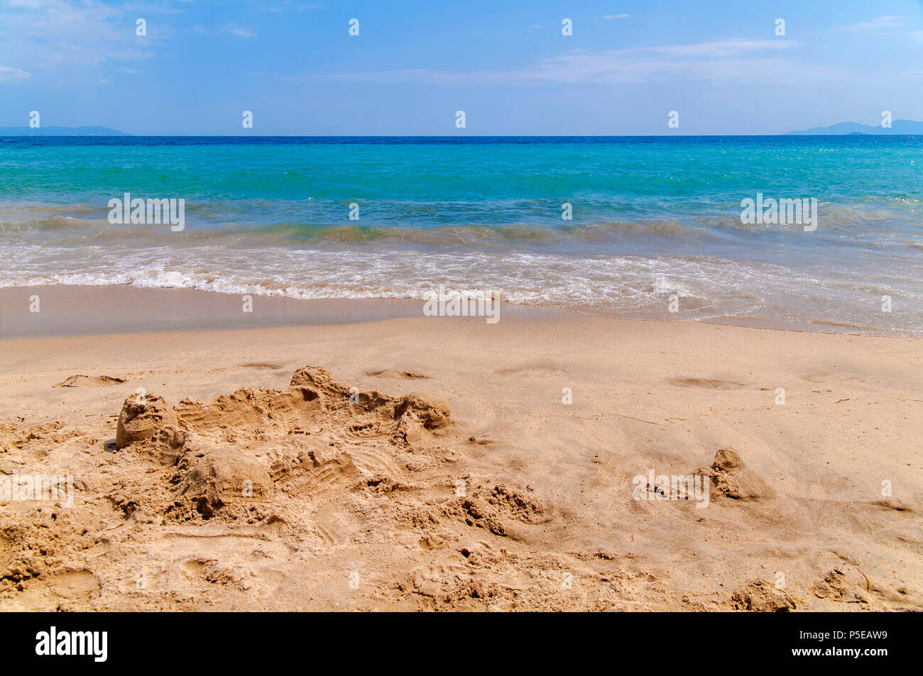 Beach with sea wave close Stock Photo - Alamy