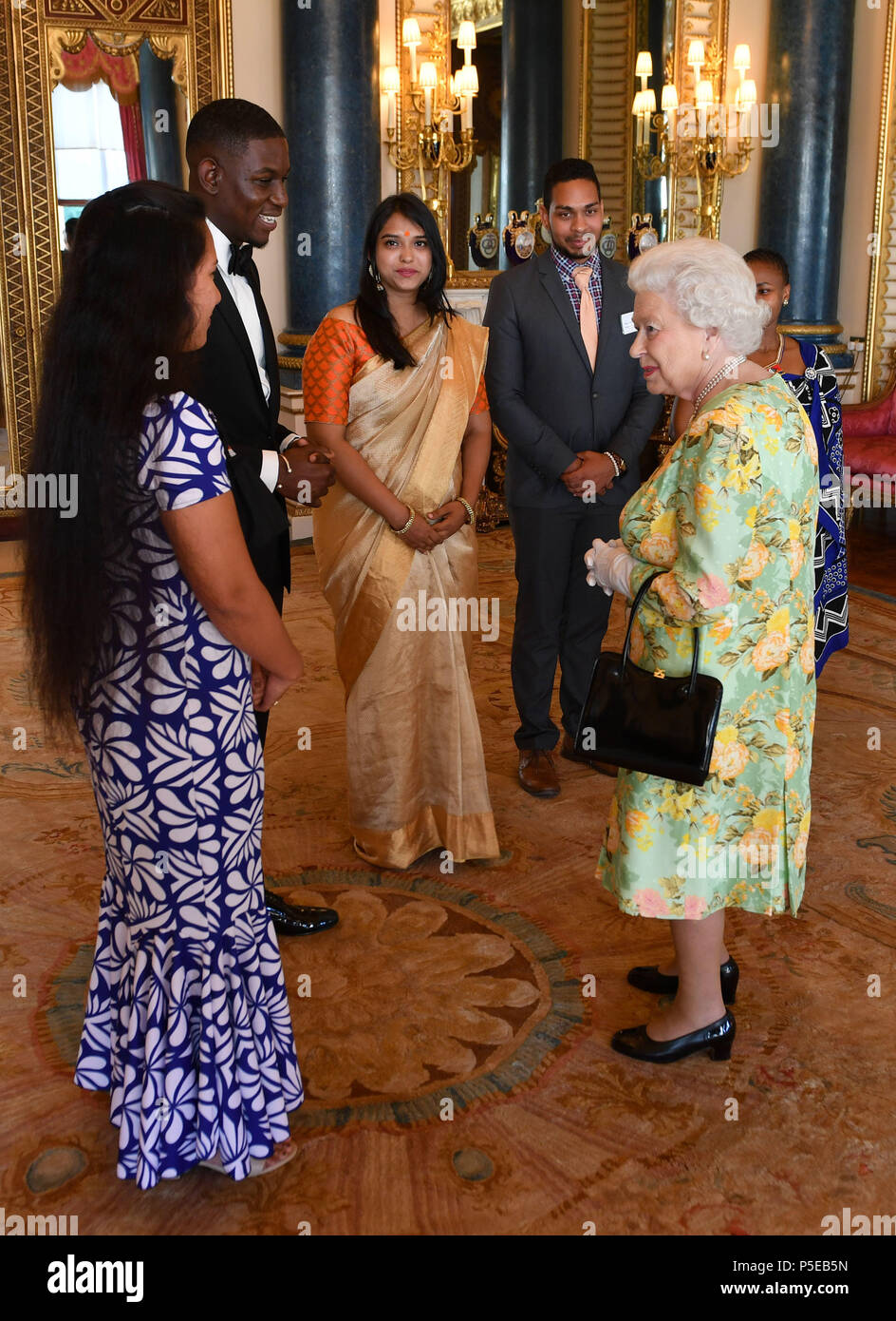 Queen Elizabeth II meets a group of Queen's Young Leaders at Buckingham ...