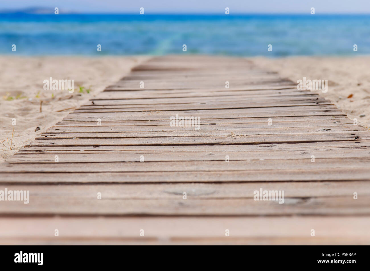 Beach wooden path and sea background Stock Photo - Alamy