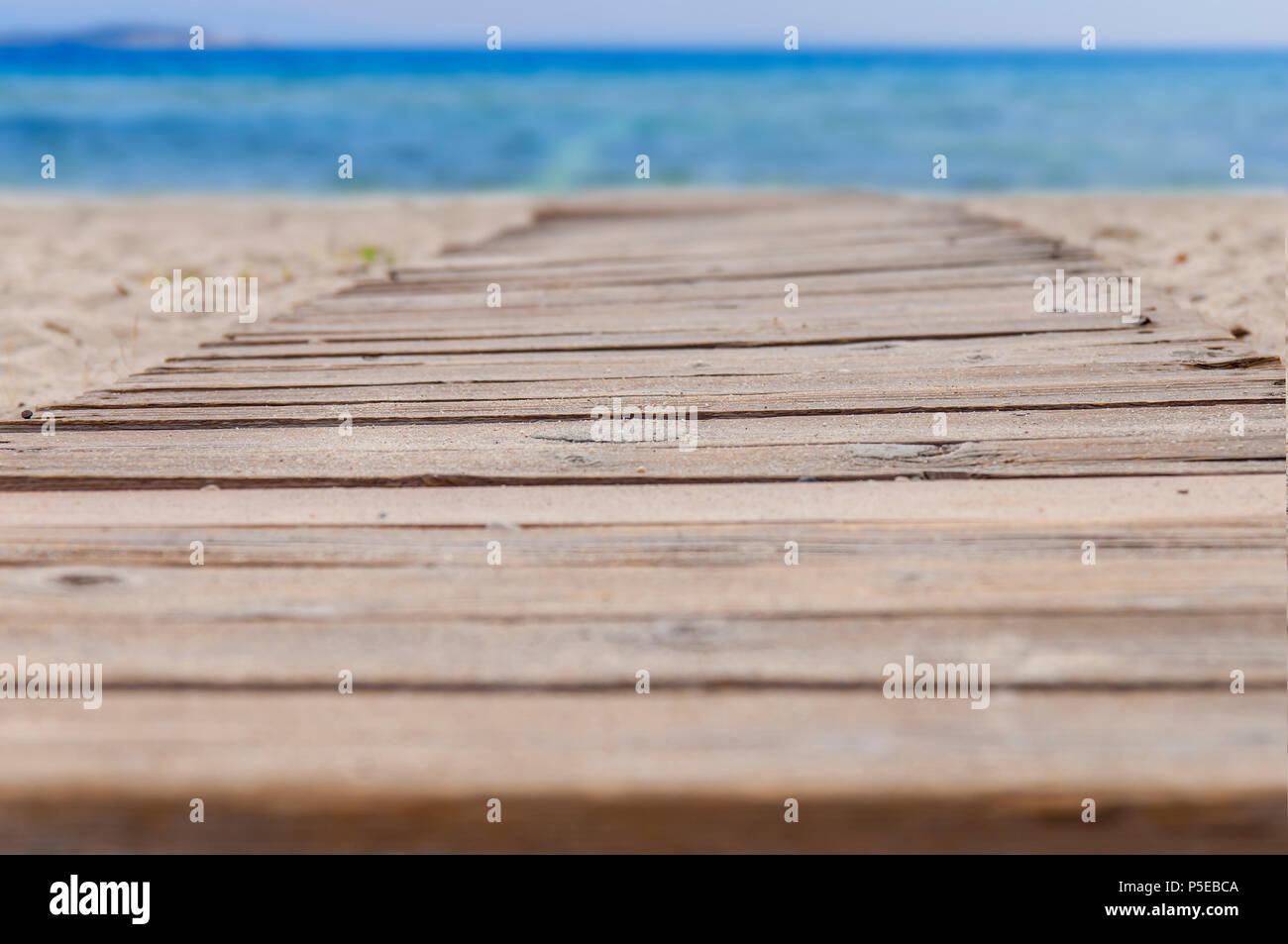 Beach wooden path and sea background Stock Photo - Alamy