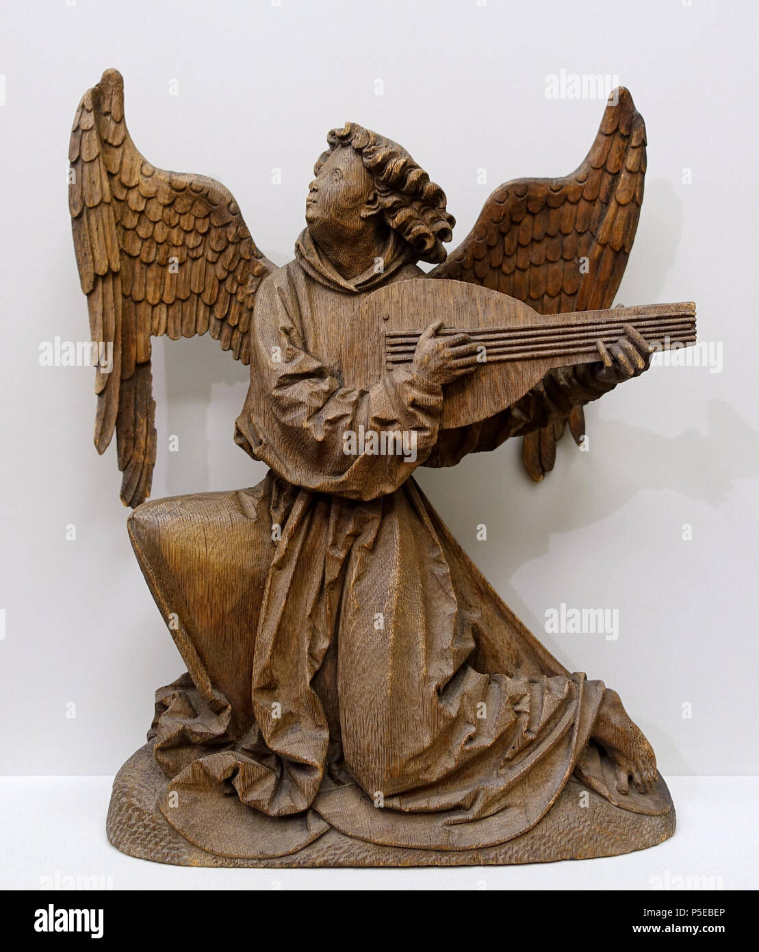 Angel playing lute hi-res stock photography and images - Alamy