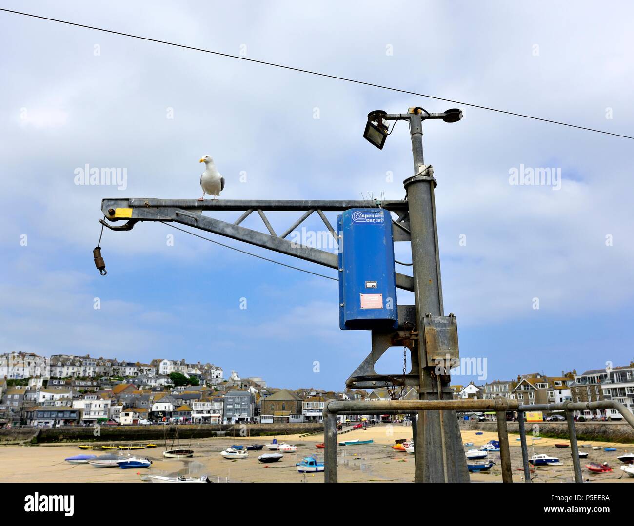 Unloading winch and davit,Mousehole Harbour,Cornwall,England,UK Stock ...