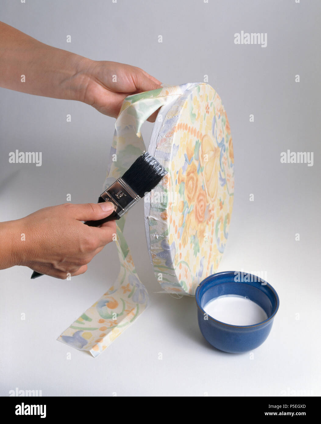 Covering a circular box lid hi-res stock photography and images - Alamy
