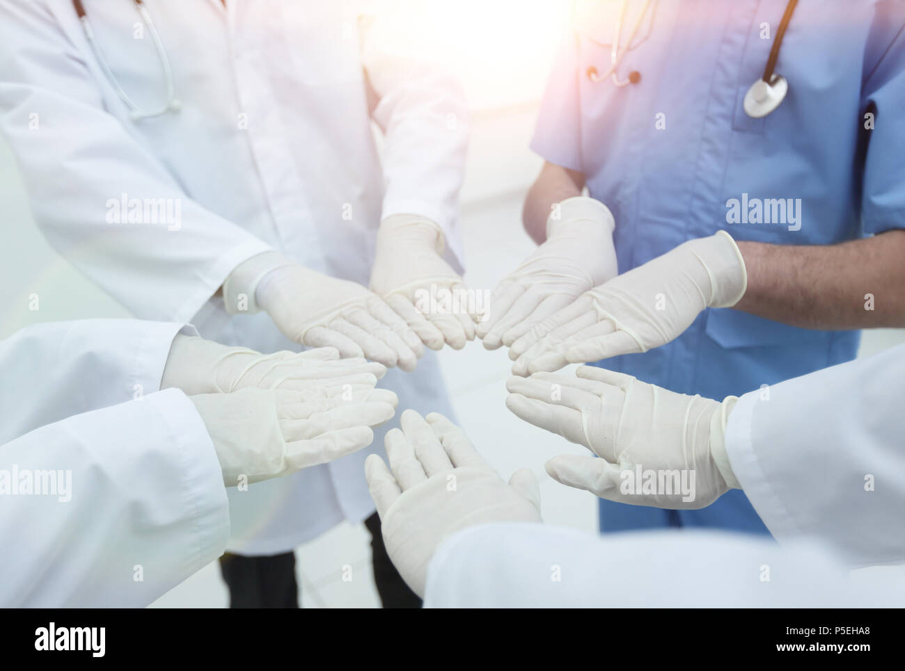 Team spirit before and after treatment Stock Photo - Alamy