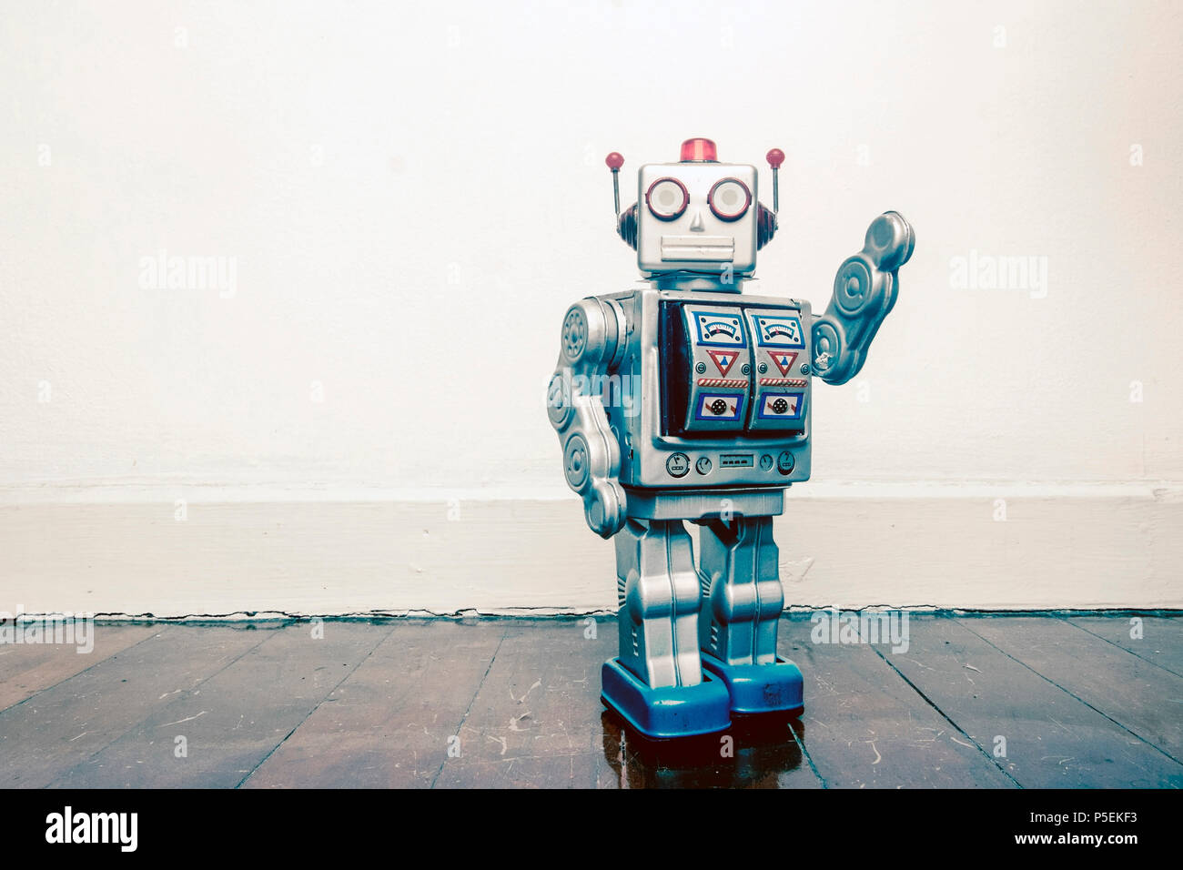 Metal robot waving hi-res stock photography and images - Alamy