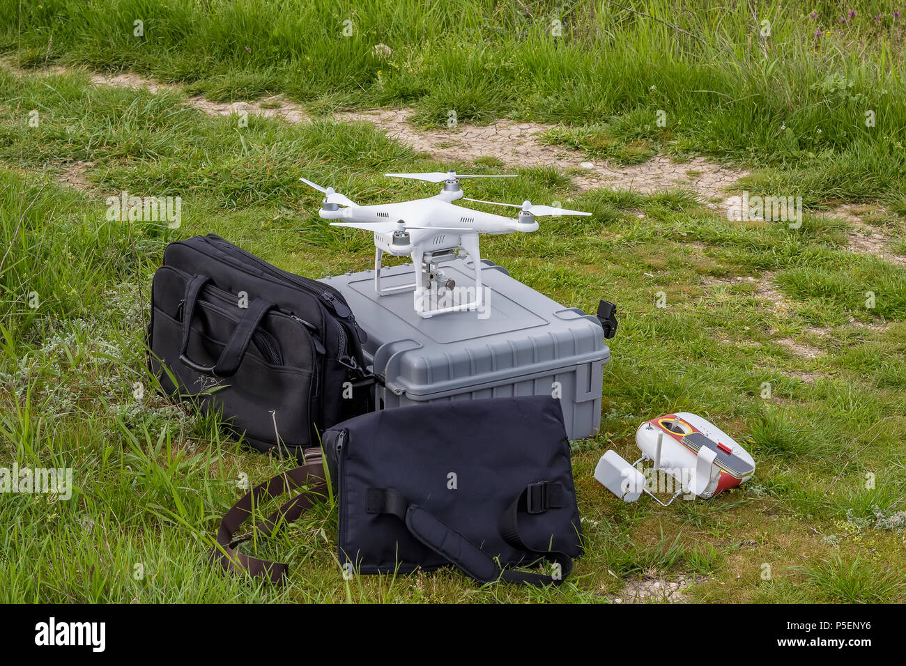 equipment and quad copter drone on the grass is ready to take off Stock ...