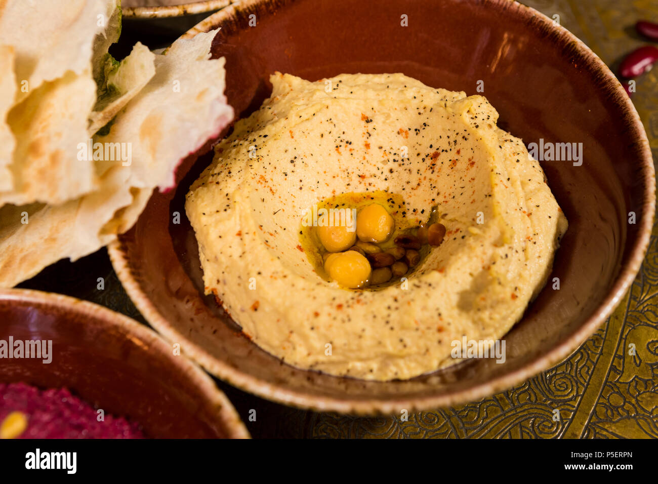 Hummus sliced pita bread hi-res stock photography and images - Alamy