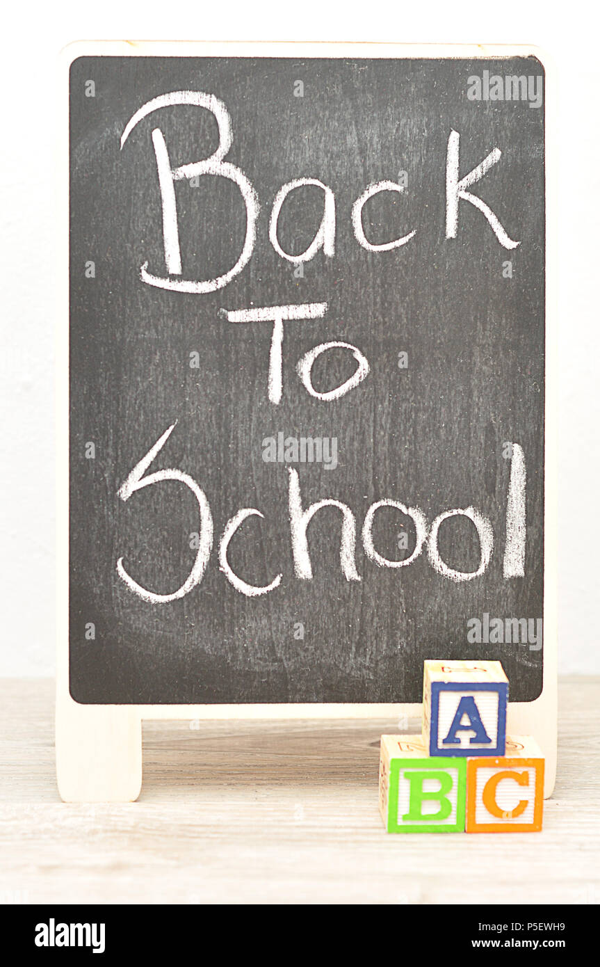 A blackboard with the words Back to School with alphabet blocks ABC ...