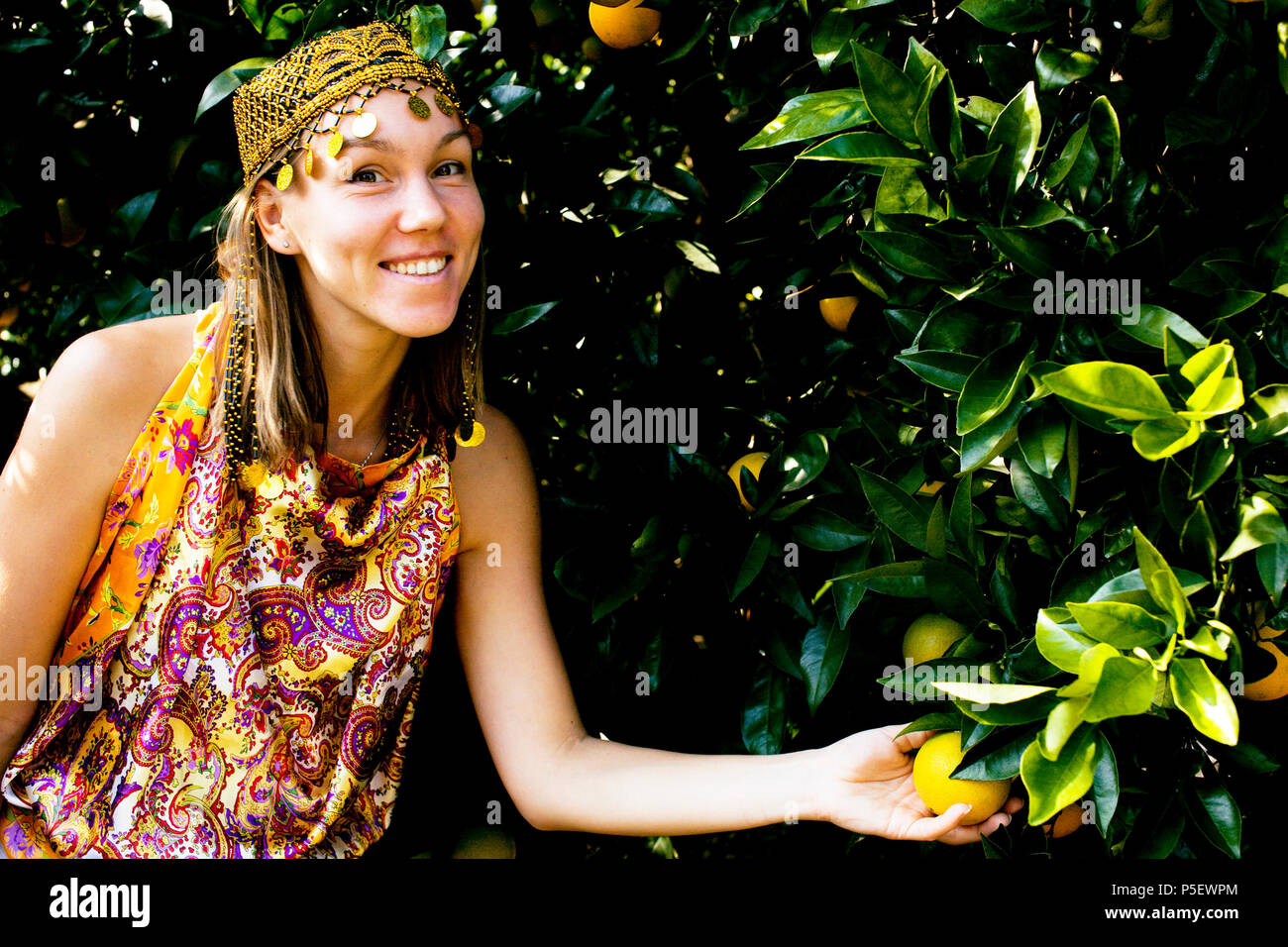 pretty islam woman in orange grove smiling, real muslim girl cheerful ...