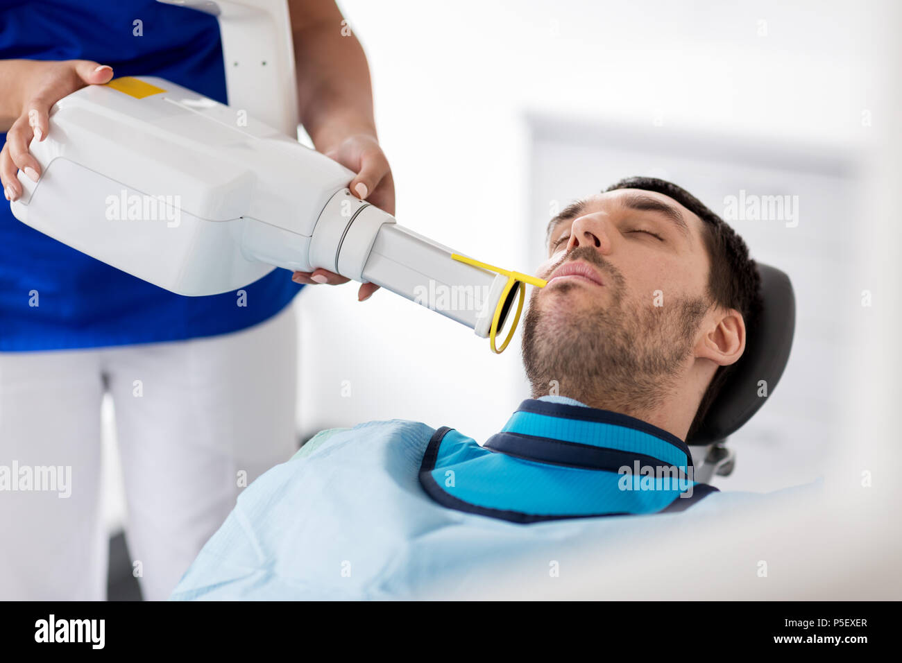 patient having x-ray of teeth at dental clinic Stock Photo - Alamy