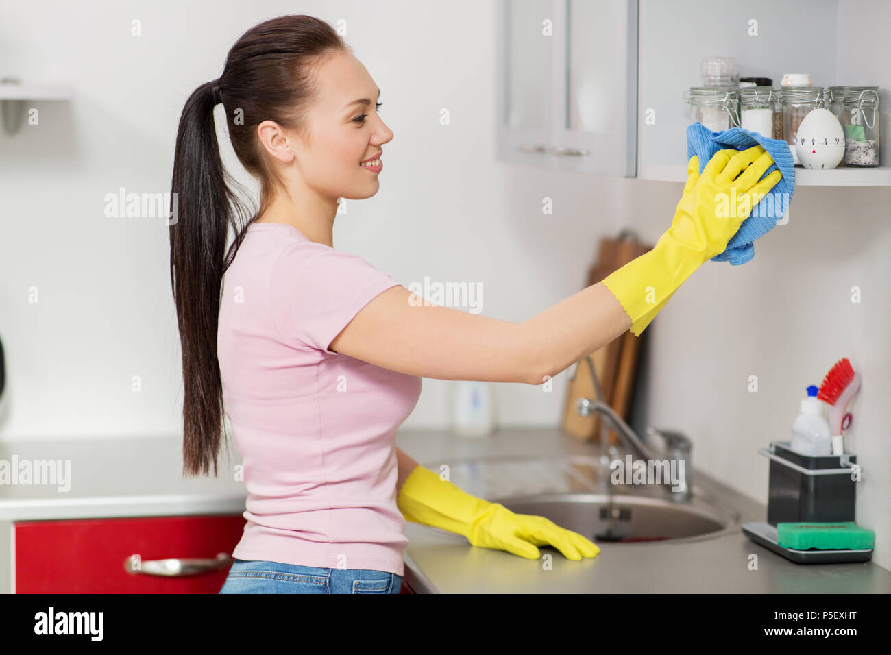 Lady cleaning kitchen table hi-res stock photography and images - Alamy