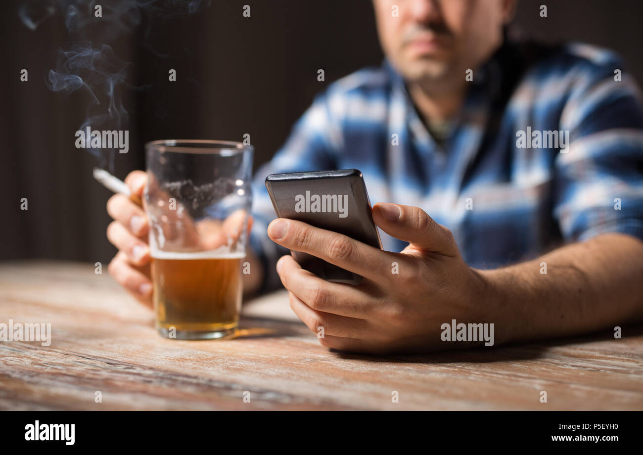 Smoking man alcohol hi-res stock photography and images - Alamy