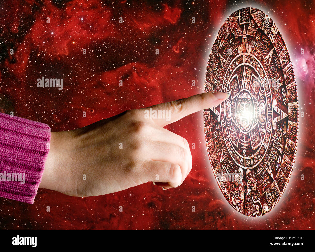 hand touching the Aztec stone calendar Stock Photo - Alamy