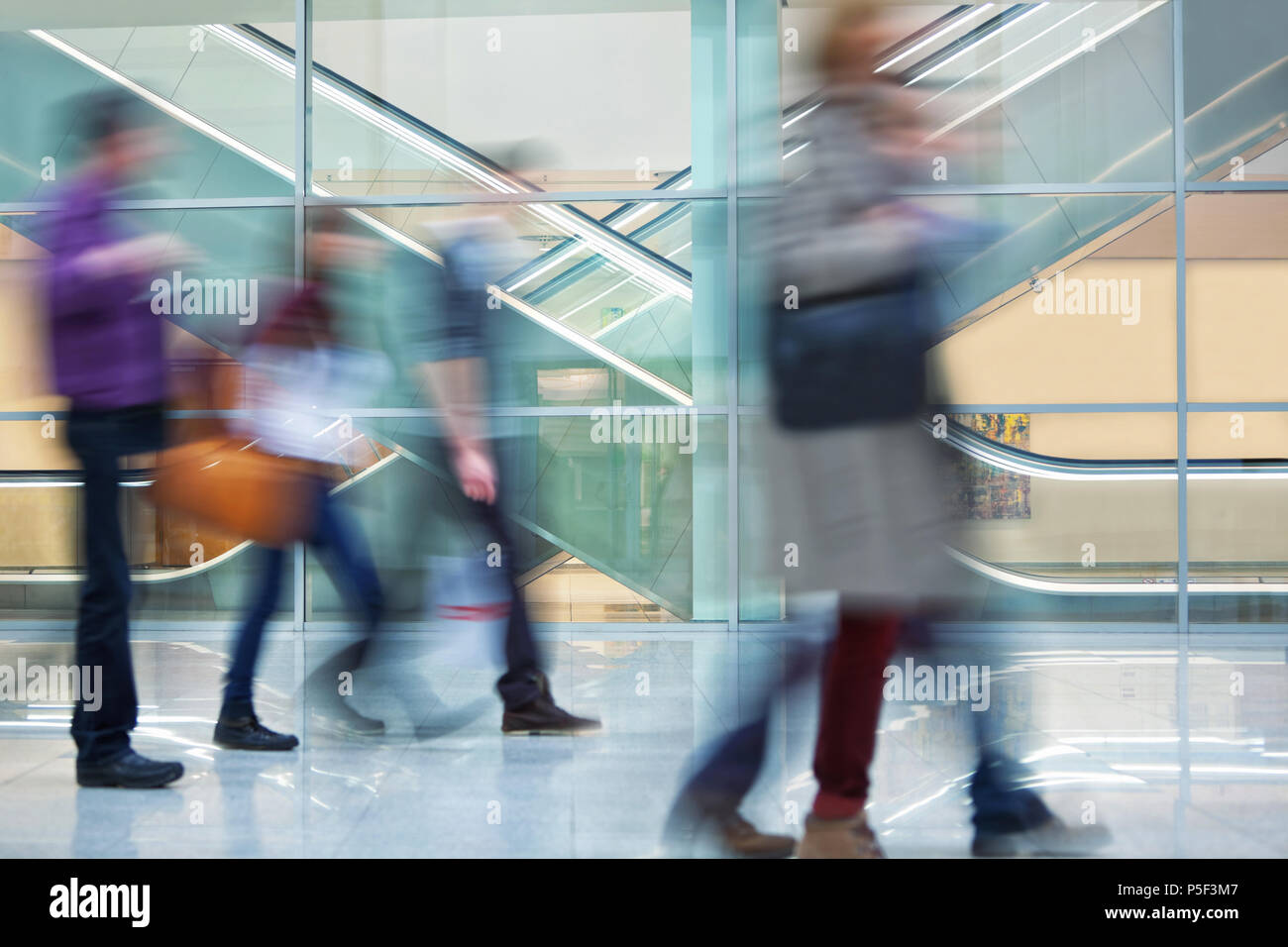 people rushing through corridor Stock Photo - Alamy