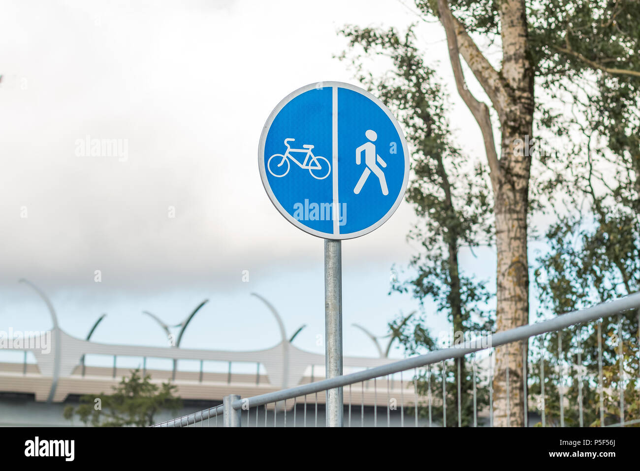 Cyclists and pedestrians blue road sign hi-res stock photography and ...