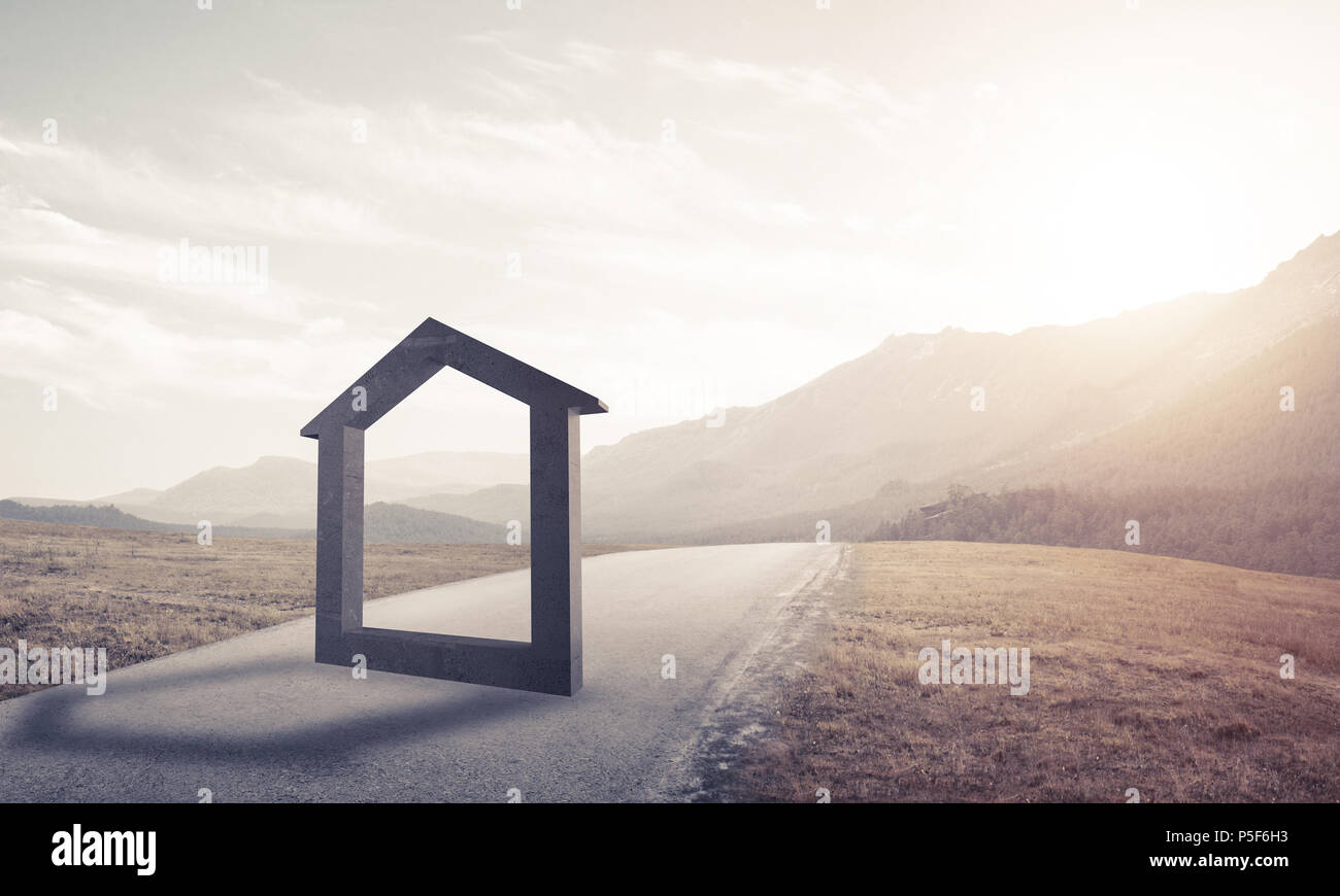 House stone figure as symbol of real estate outdoors against natural ...