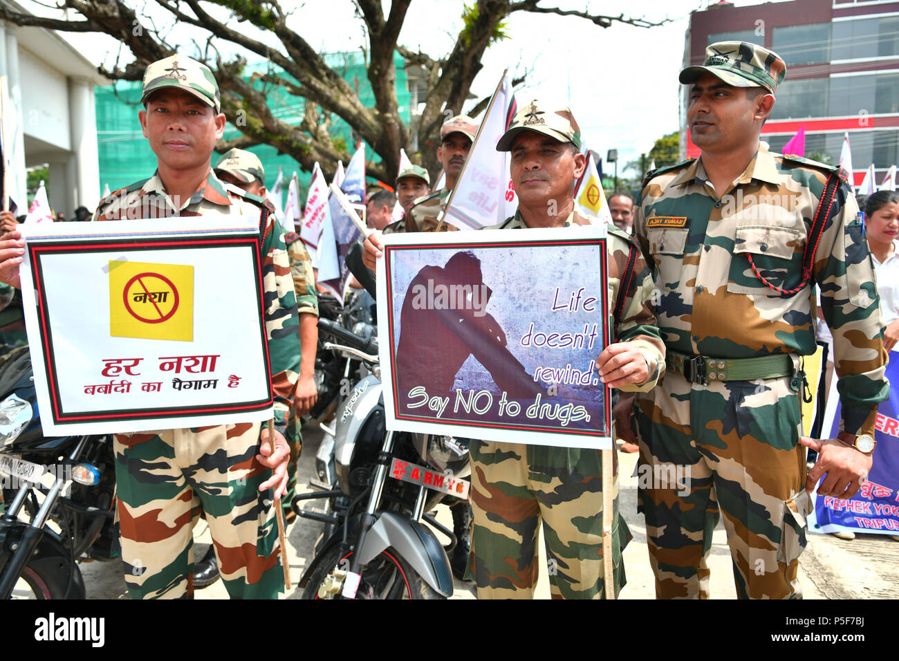 Members of Indian Paramilitary Force holding posters during the rally ...