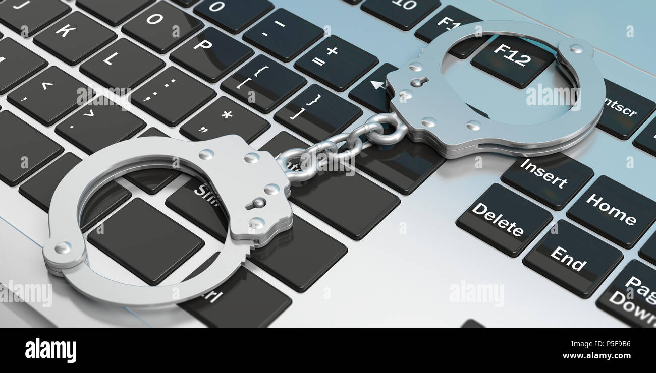 Cyber crime concept. Metal handcuffs on computer keyboard, 3d ...