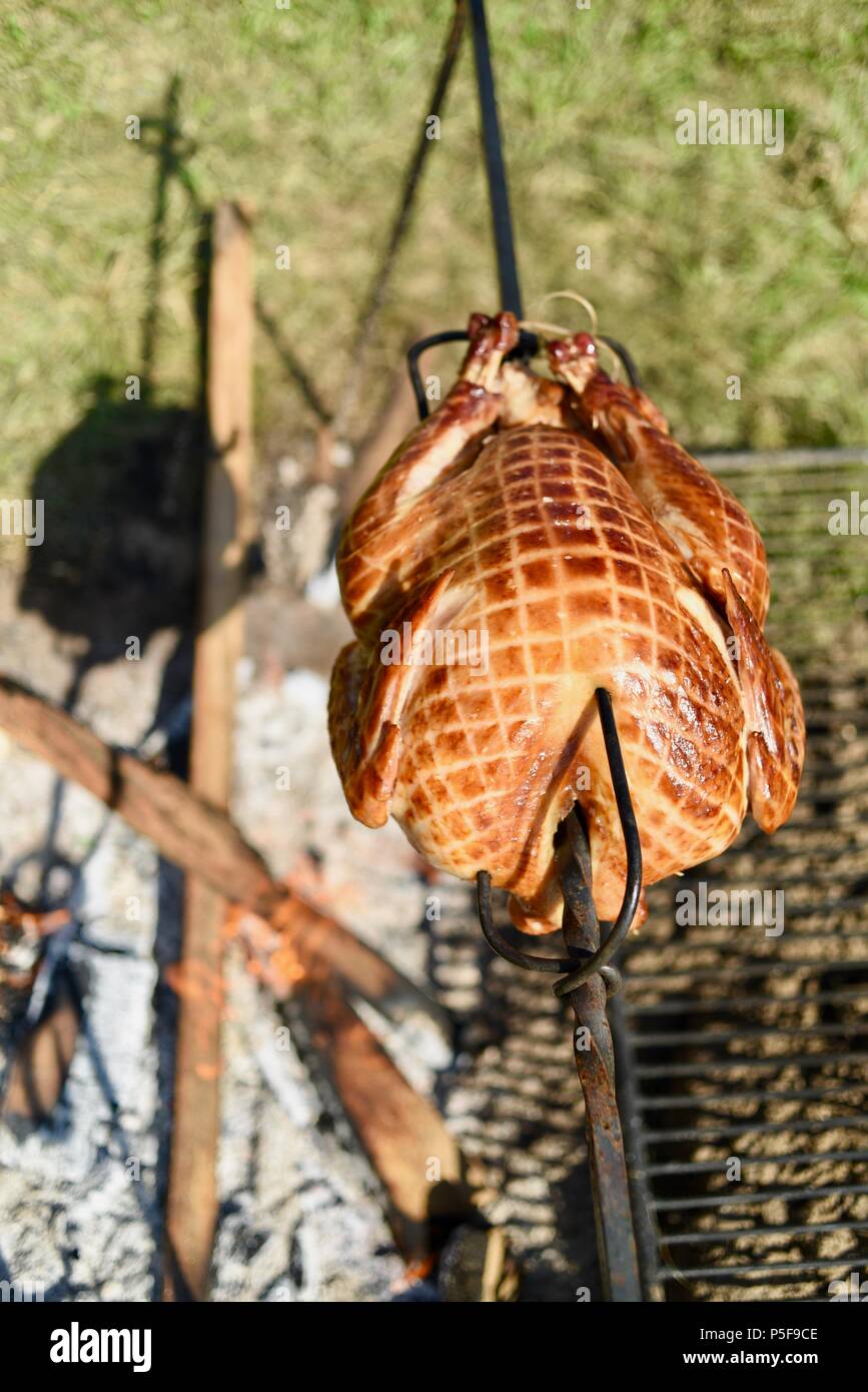 Rotisserie over fire hi-res stock photography and images - Alamy