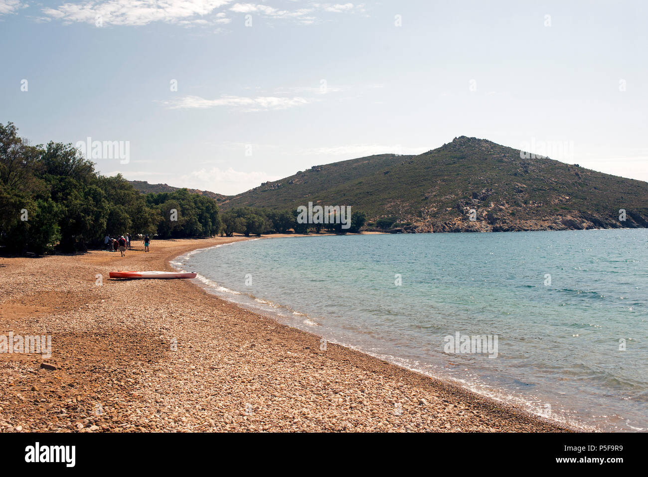 A view of a beach and a canoe in the beautiful island of Patmos, Greece ...