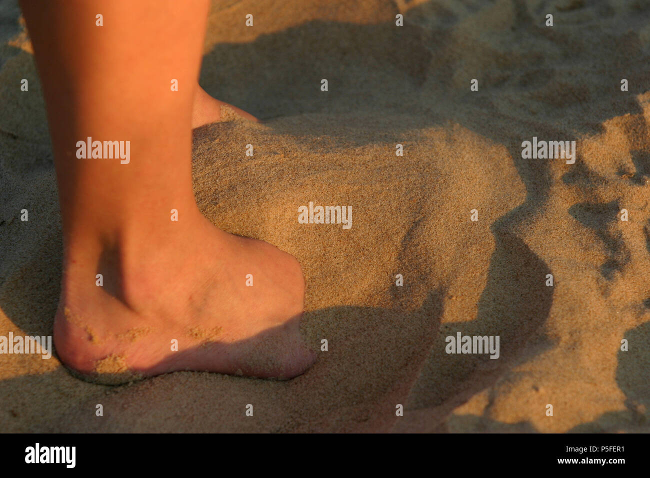 Toes in the Sand Stock Photo - Alamy