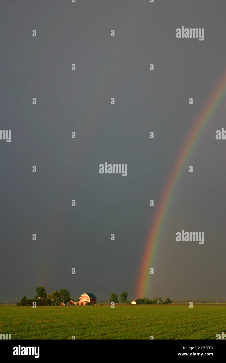 Farm with Red Barn and Rainbow Stock Photo - Alamy