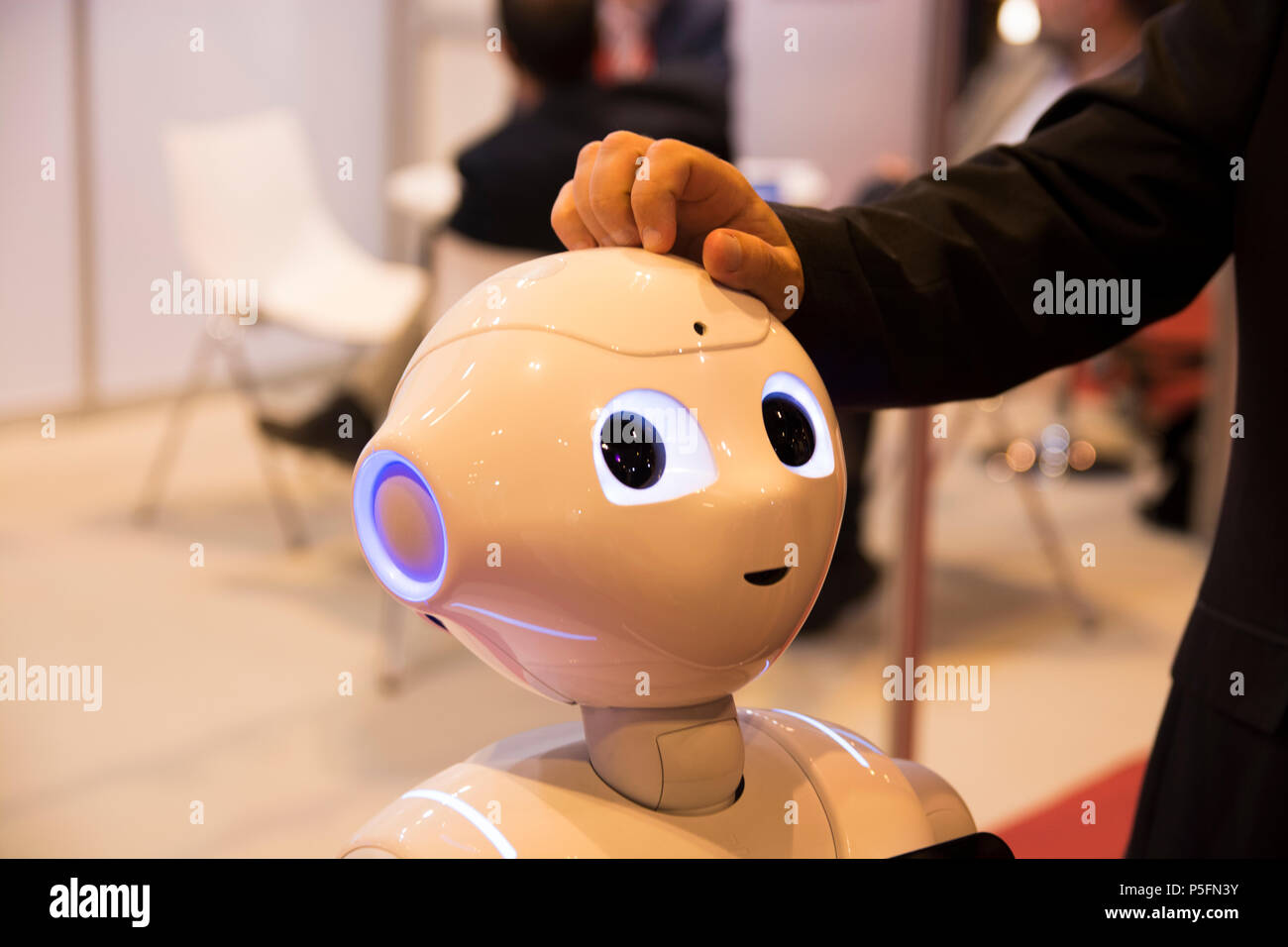 Child interacting robot hi-res stock photography and images - Alamy