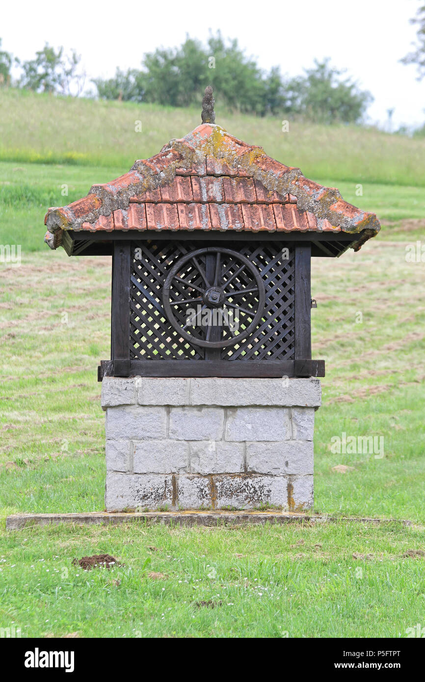 Very Old Water Well With Manual Pump Stock Photo - Alamy