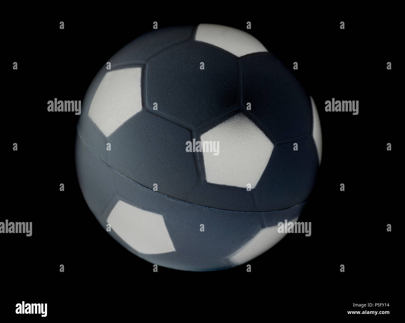 Black Soccer ball on a black background Stock Photo - Alamy