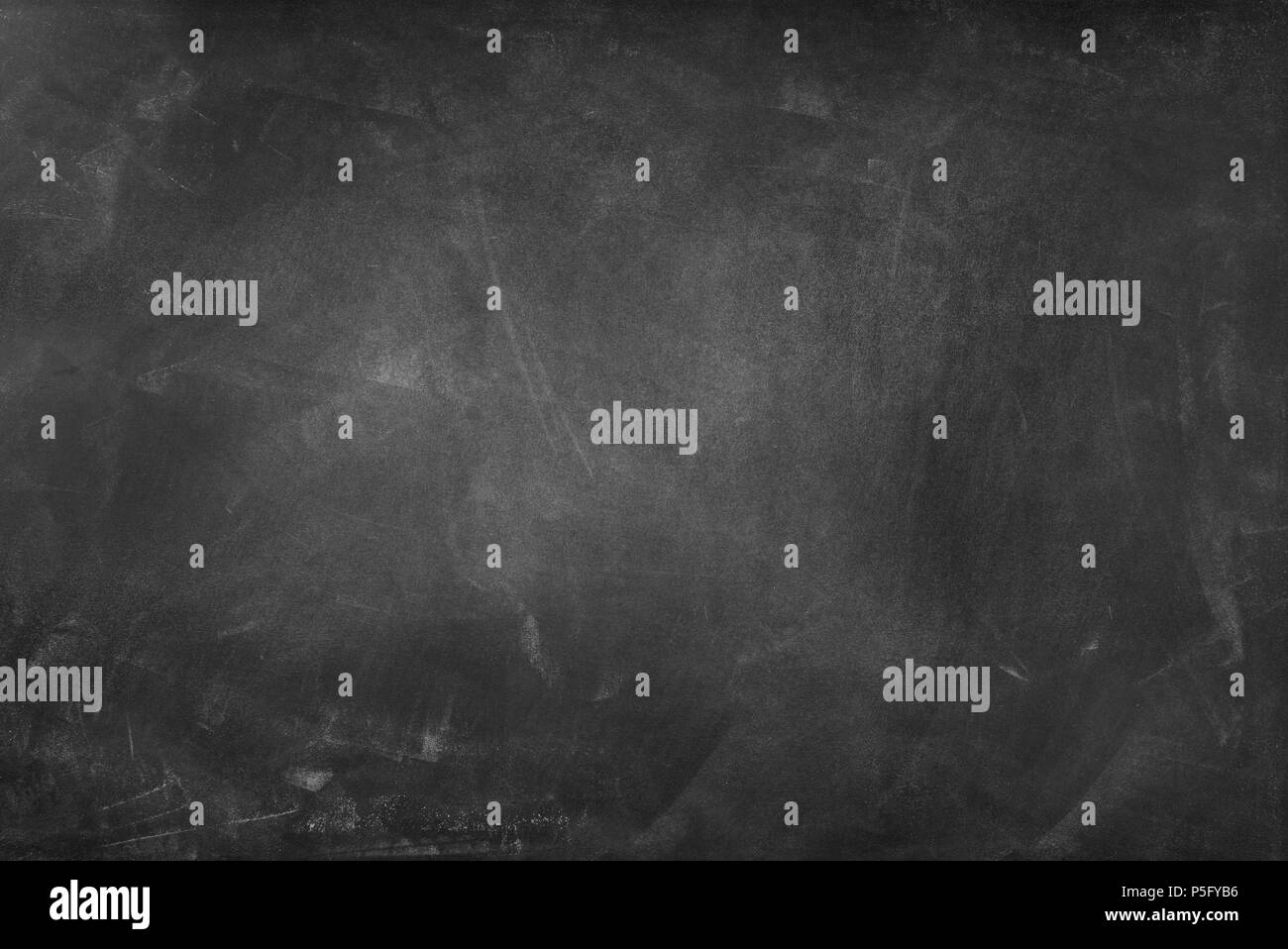 Chalk rubbed out on blackboard background Stock Photo - Alamy