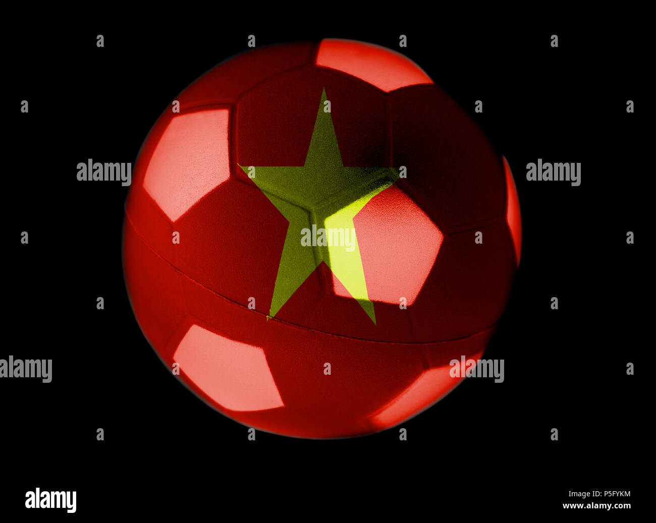 Red Soccer ball with star on a black background Stock Photo - Alamy
