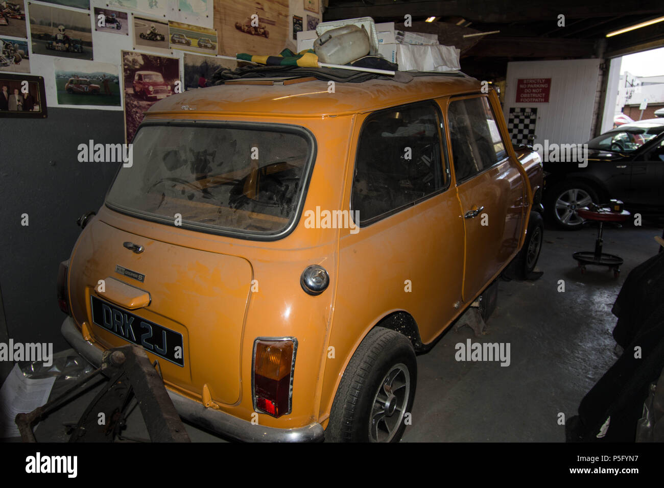 Yellow classic mini cooper hi-res stock photography and images - Alamy