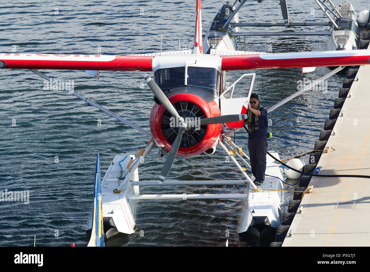 Crewman Refuels A Vintage Harbour Air Seaplanes de Havilland Canada DHC ...