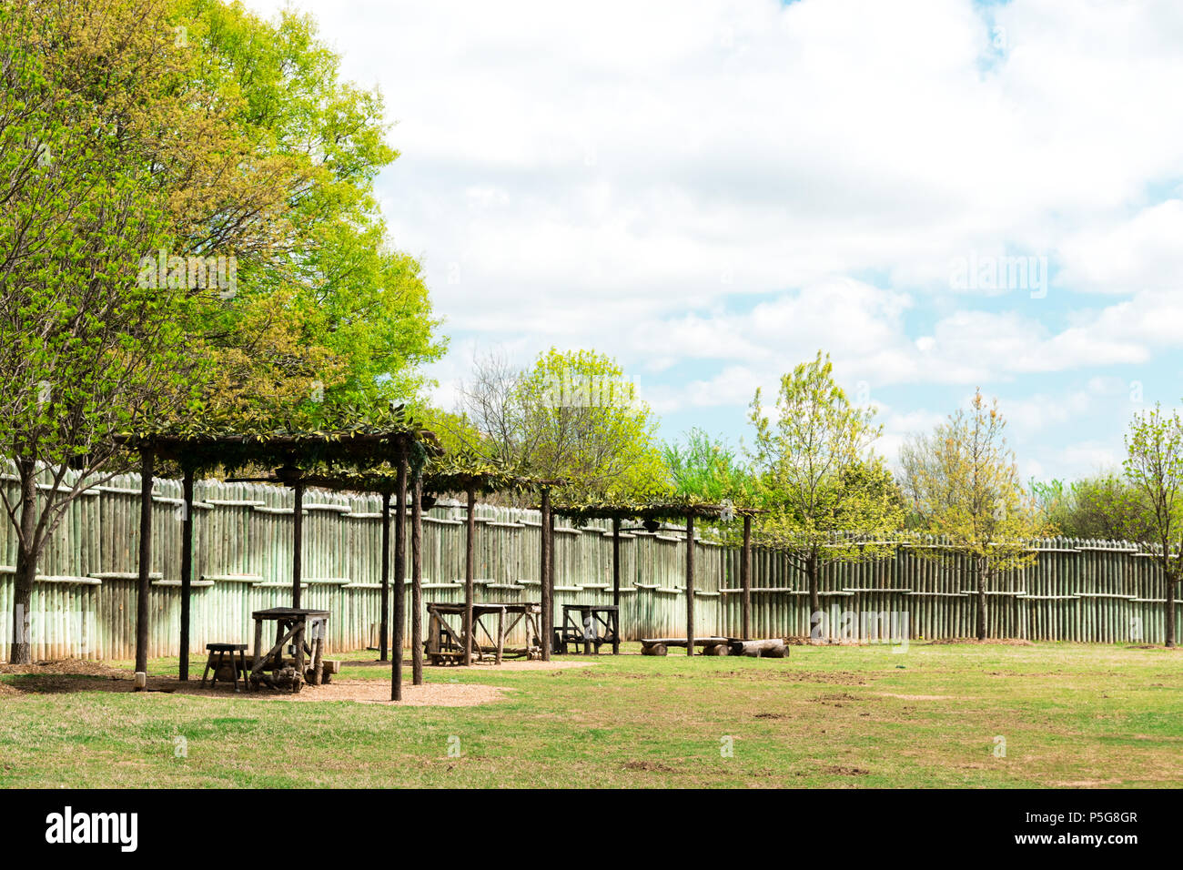 Arbors line the palisade walls of the Native American Chickasaw village ...