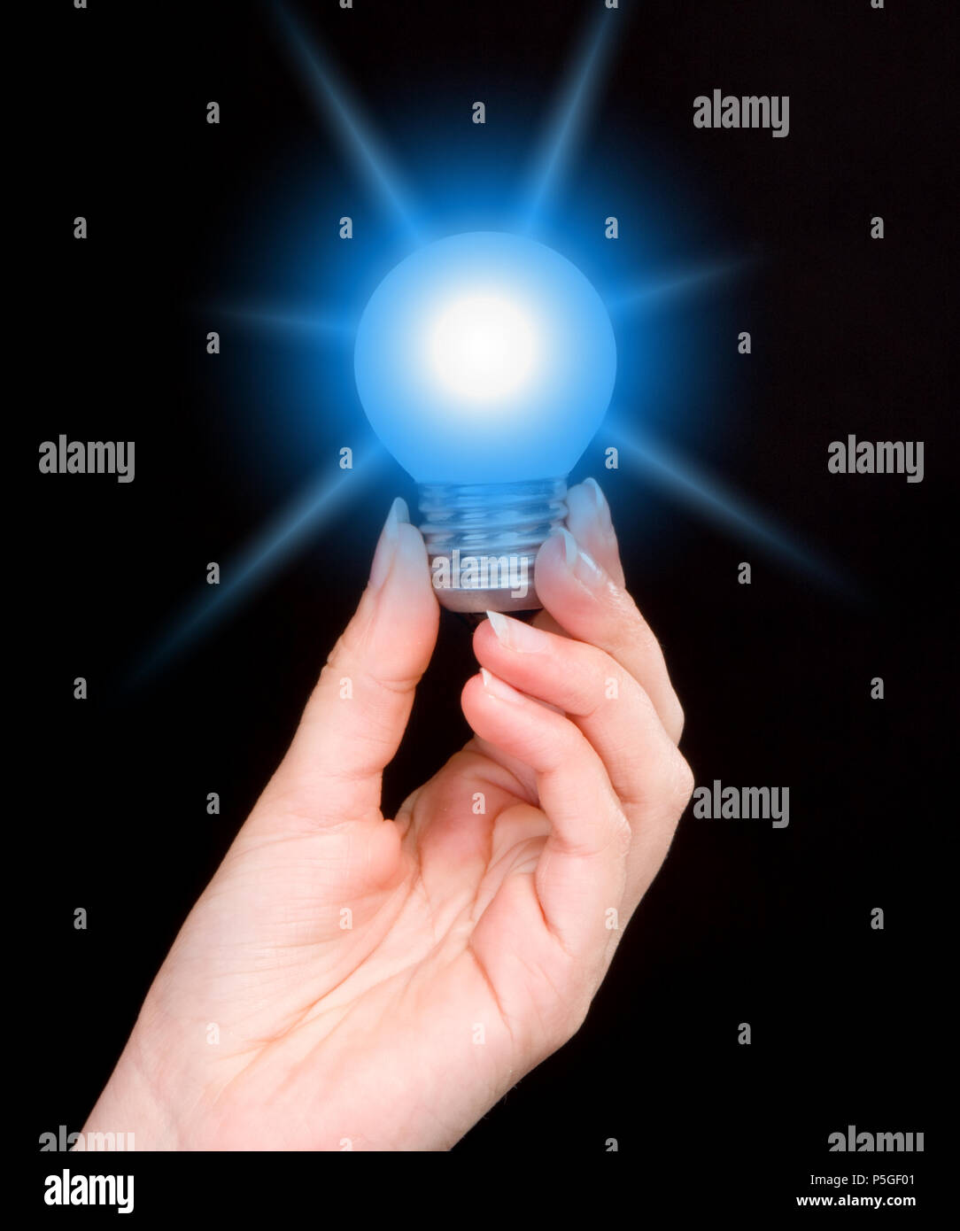 Hands of a woman holding a burning lamp Stock Photo - Alamy