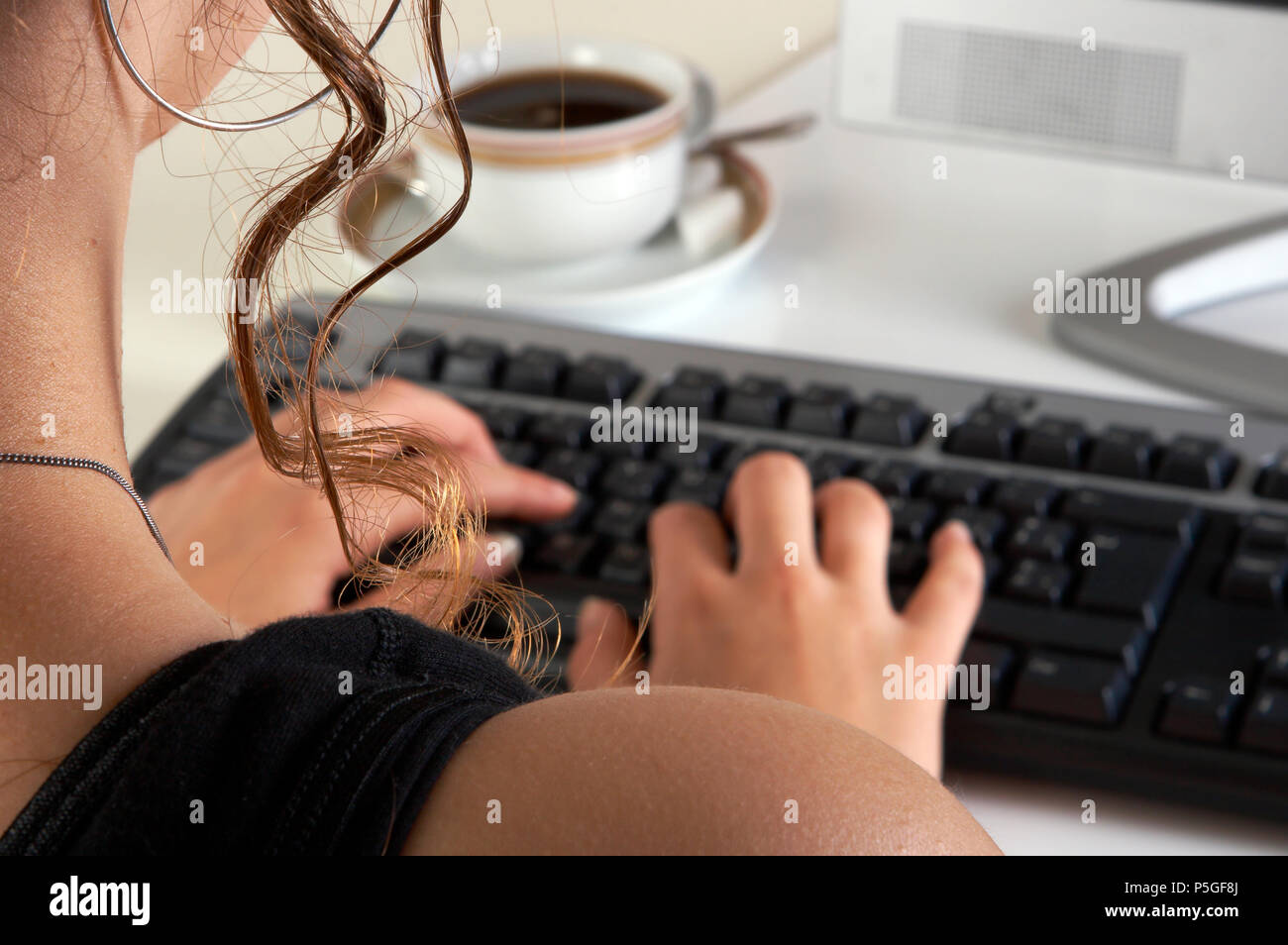 View over the shoulder of a young secretary Stock Photo - Alamy