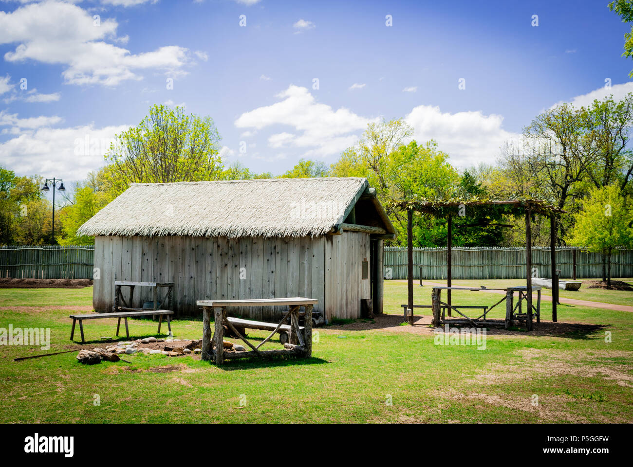 Rectangular Native American summer house, arbor, table and benches ...