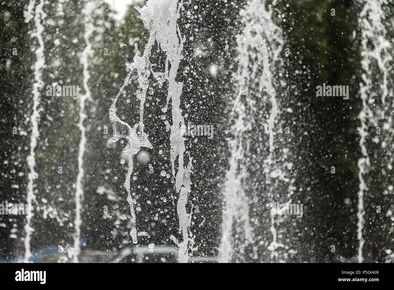Splashing water from a fountain. Stopping fluid movement Stock Photo ...